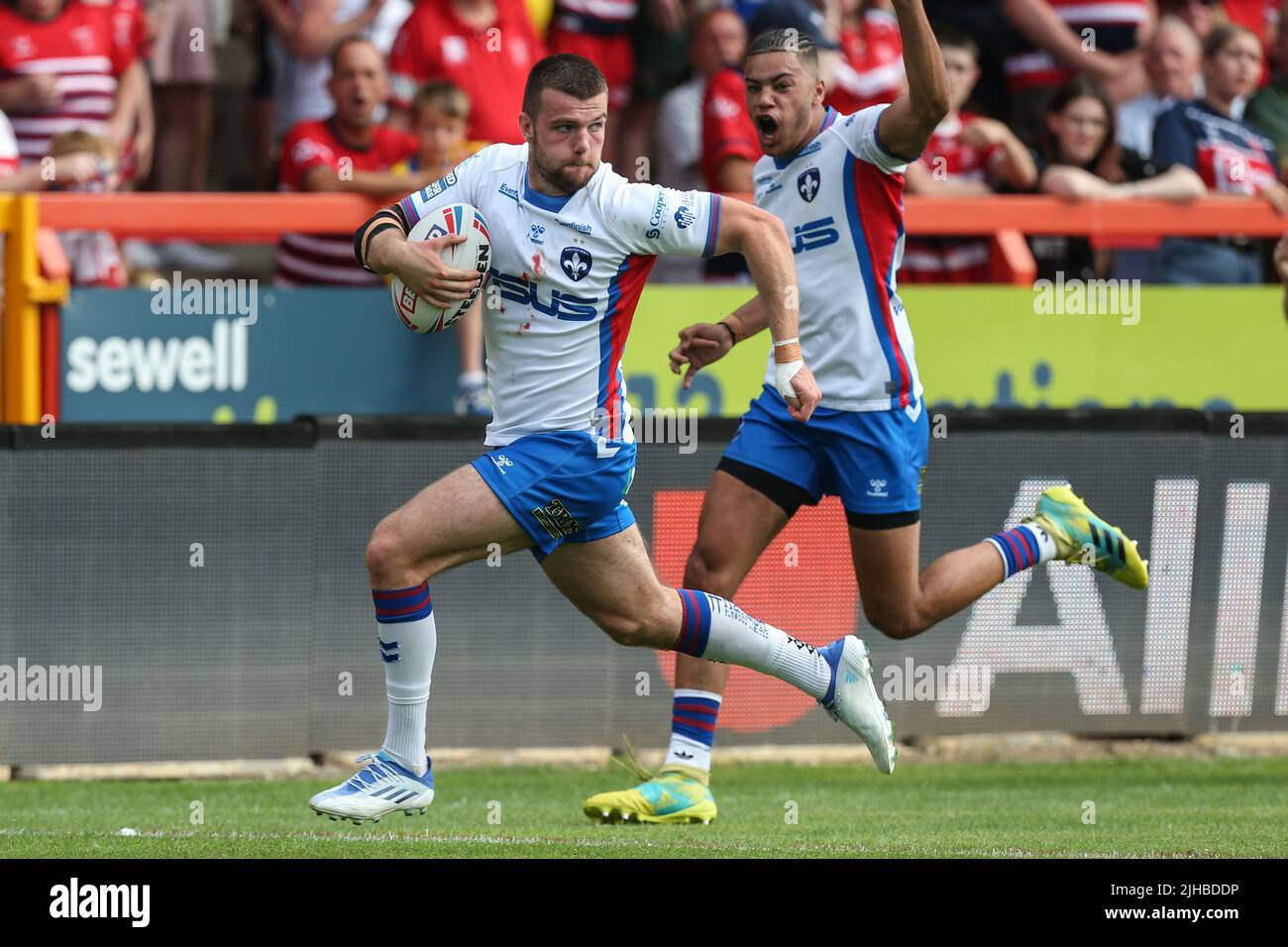 Max Jowitt #1 of Wakefield Trinity gets past Lachlan Coote #1 of Hull ...