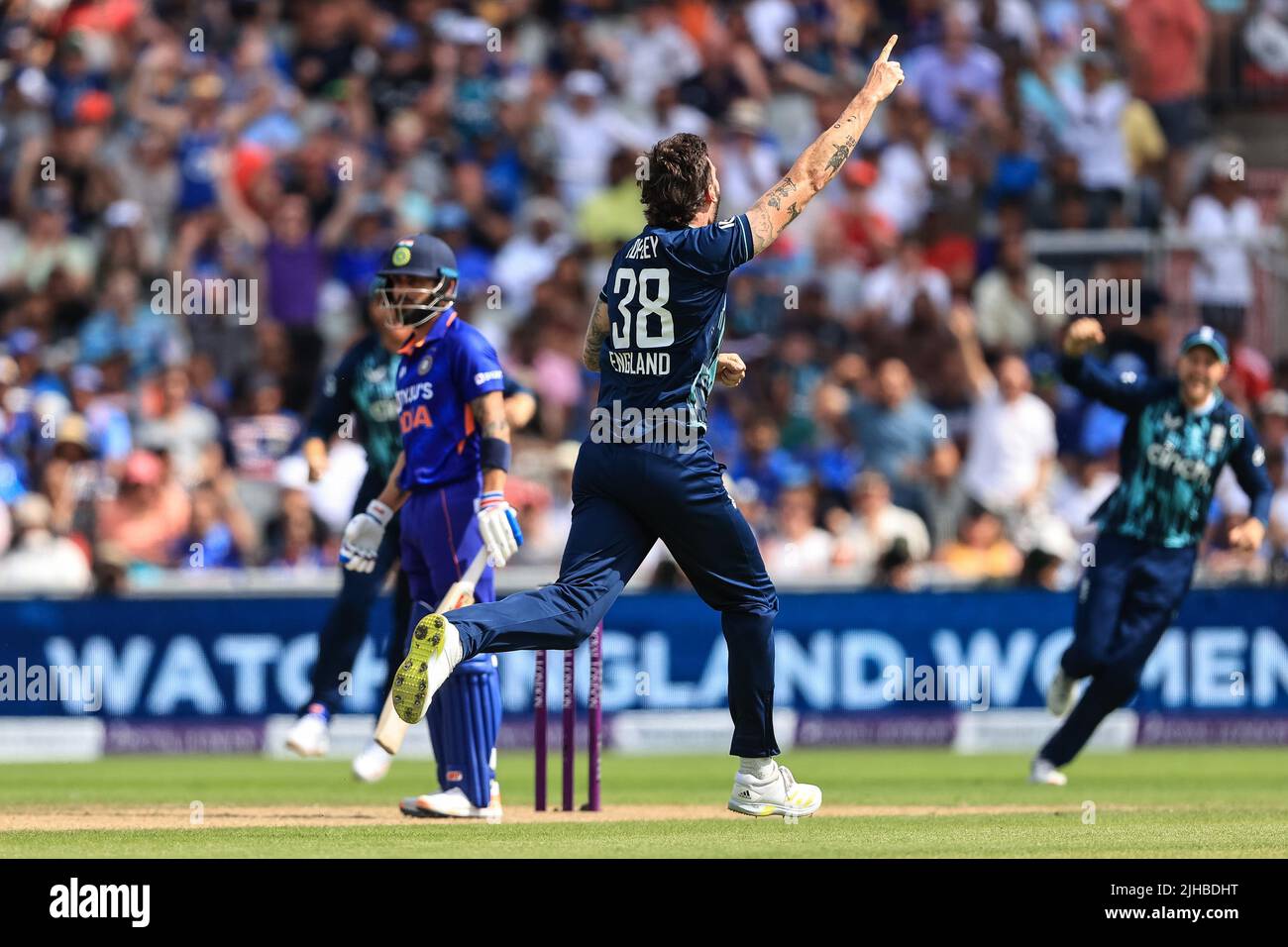 Reece Topley of England celebrates the wicket of Virat Kohli of India ...