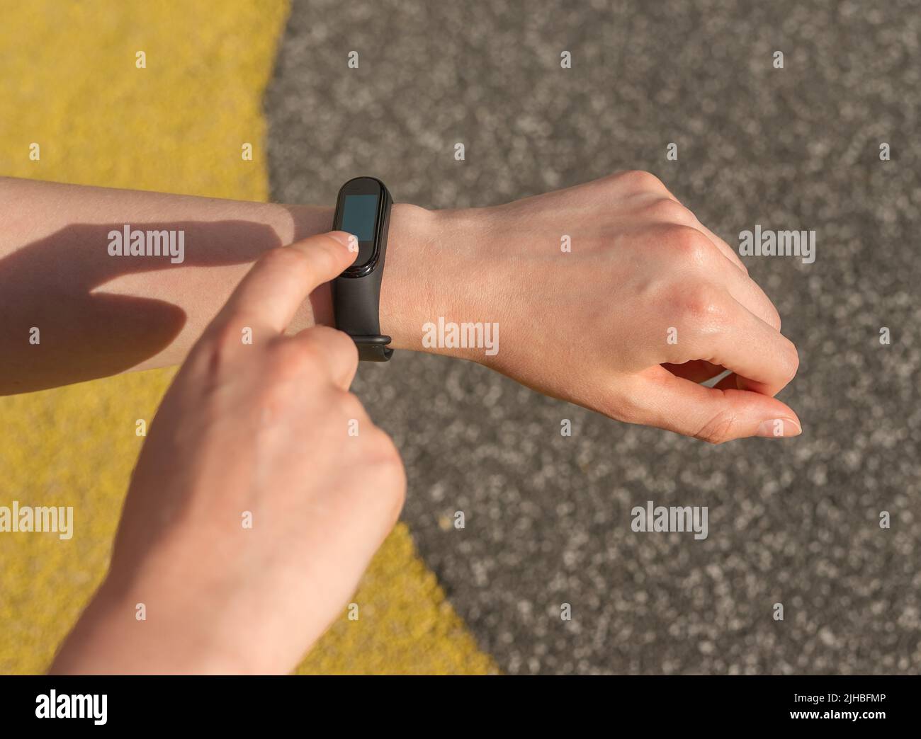 Woman jogging activity tracker hi-res stock photography and images - Alamy
