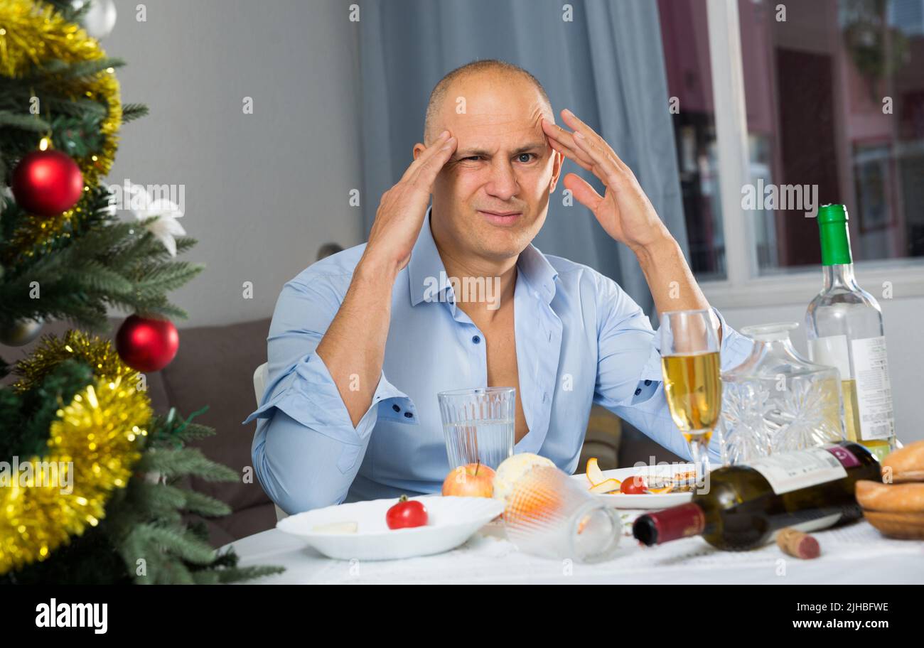 Sad man sit table alone hi-res stock photography and images - Alamy