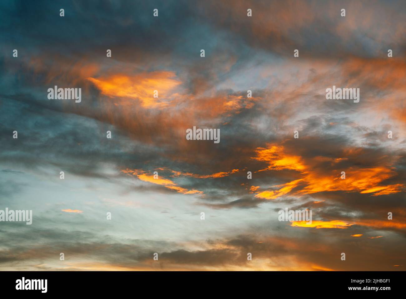 beautiful landscape on sea with sunset, dramatic clouds with red fire ...