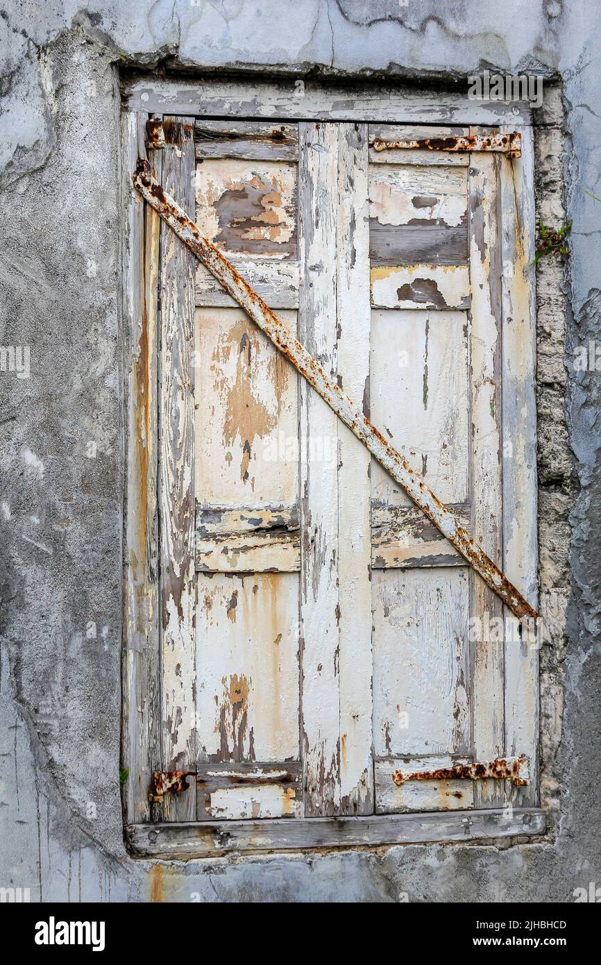 old window painted white oil, paints spilled, iron locked Stock Photo ...