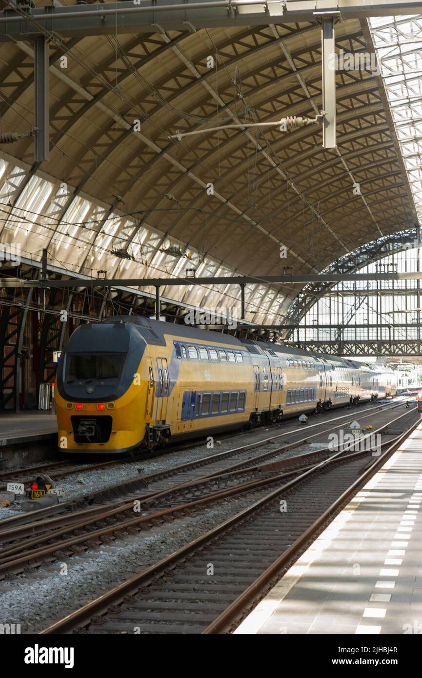 Stationary Dutch NS double decker train at Amsterdam Centraal Station ...