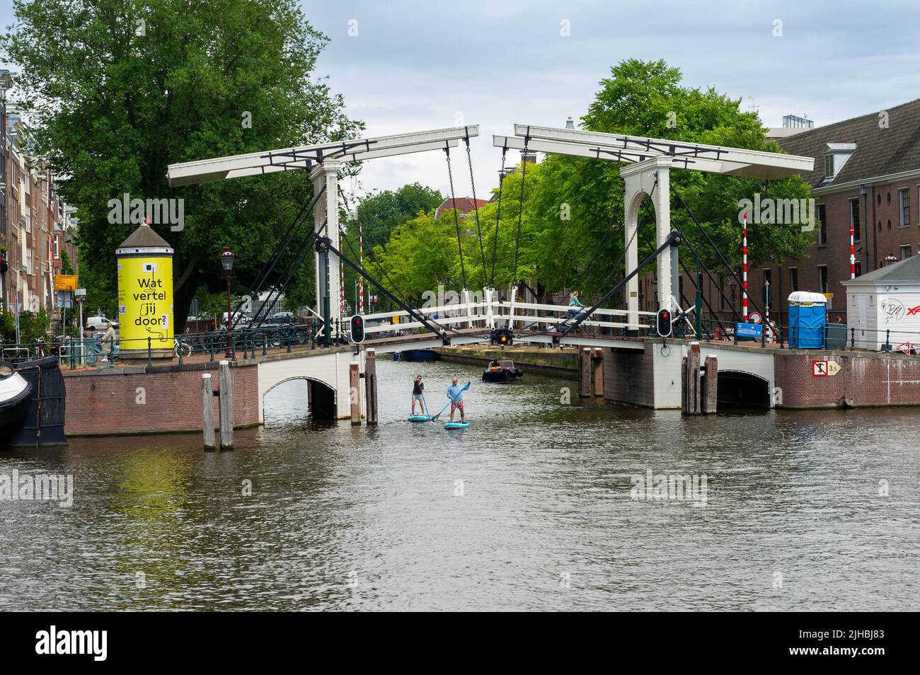 Paddle Boarders passing under the Walter Suskindbrug, Amsterdam ...