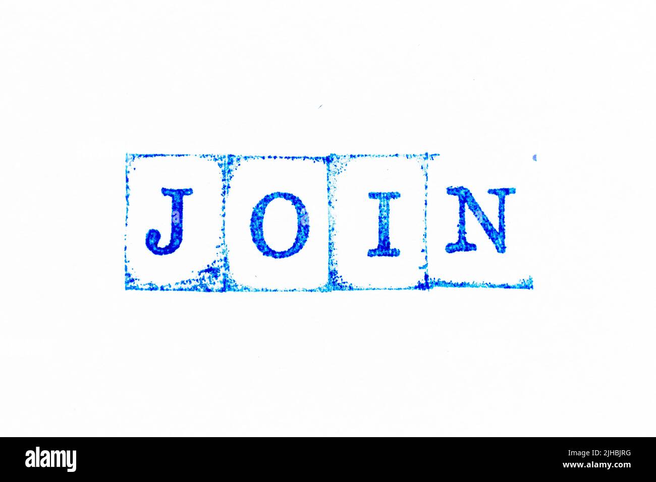 Blue color ink rubber stamp in word join on white paper background ...