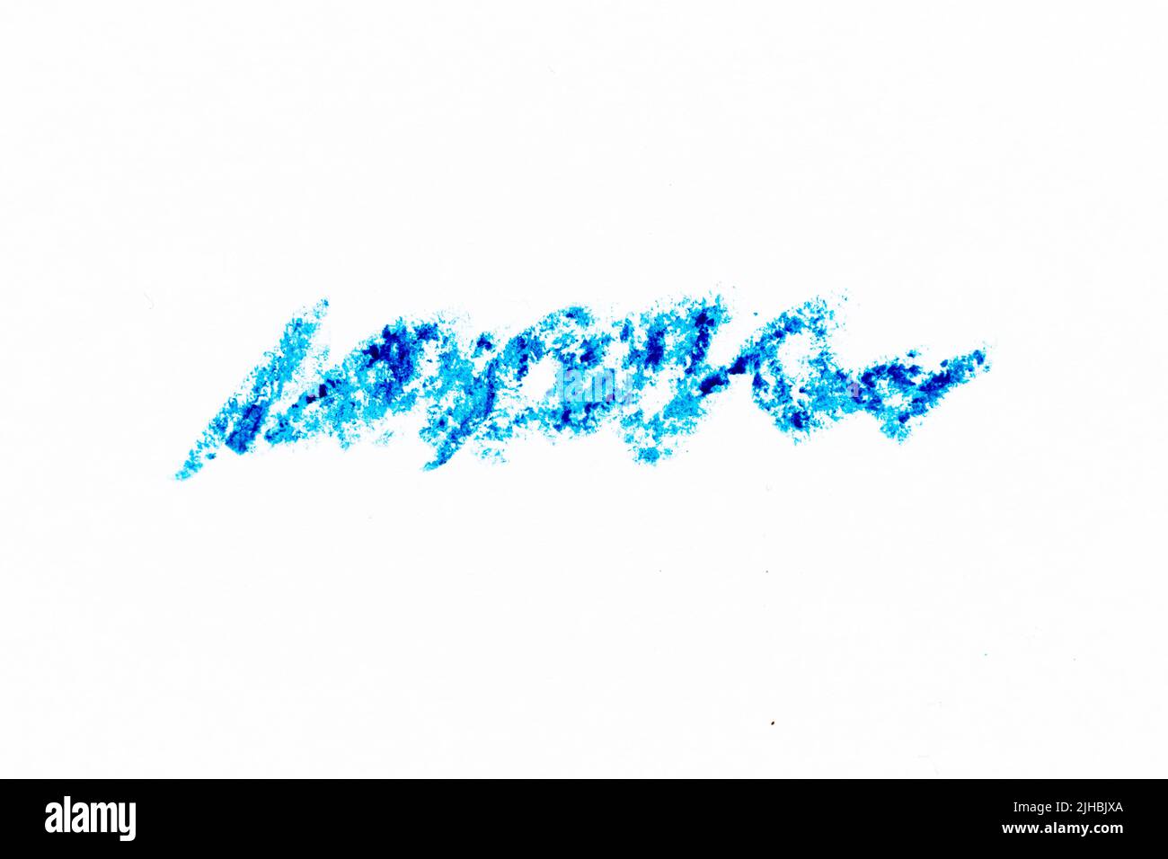 Blue color crayon hand drawing in sribble line shape on white paper ...