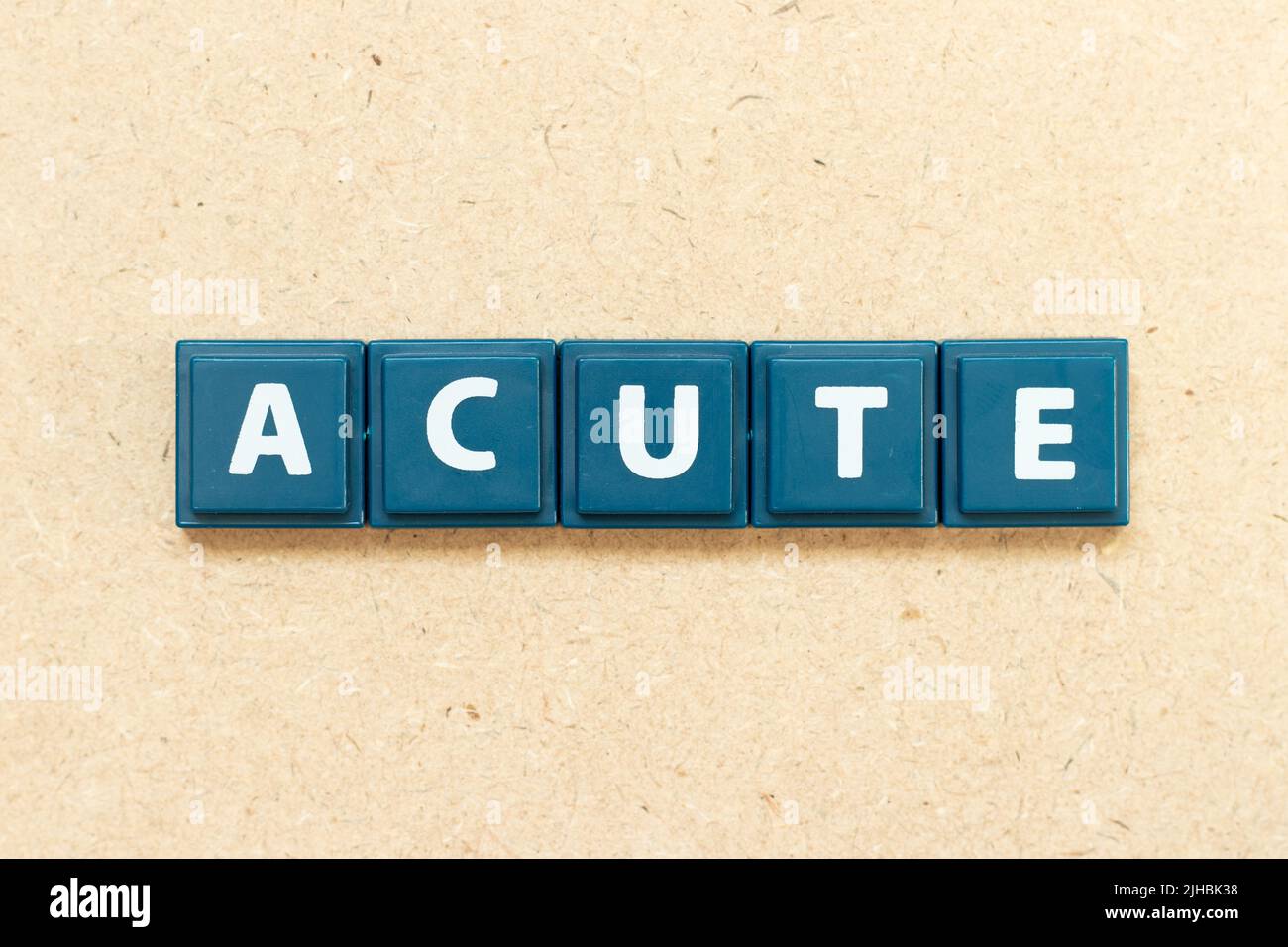 Tile alphabet letter in word acute on wood background Stock Photo - Alamy