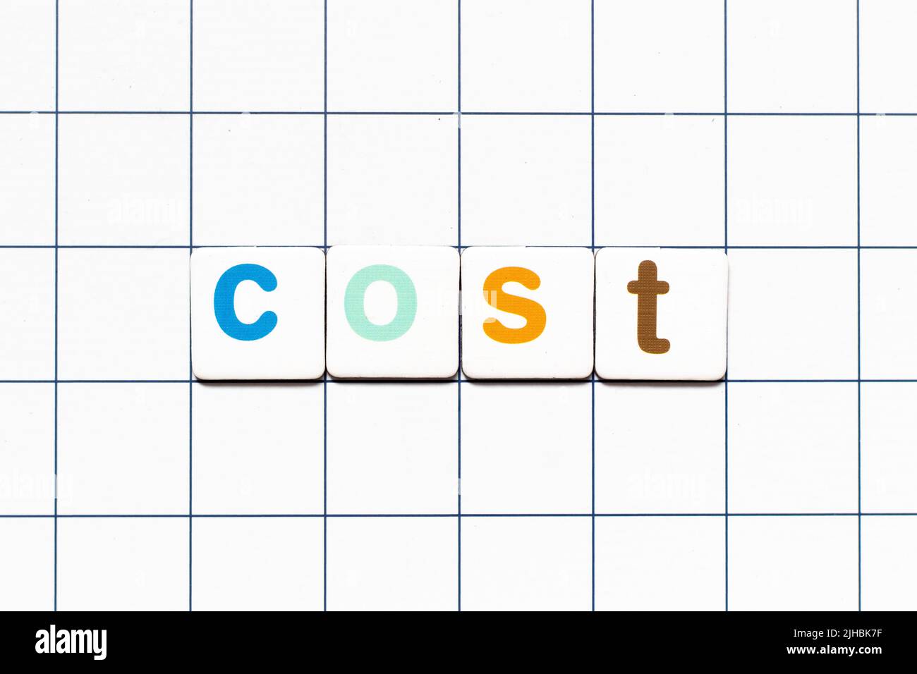 Colorful tile letter in word cost on white grid background Stock Photo ...