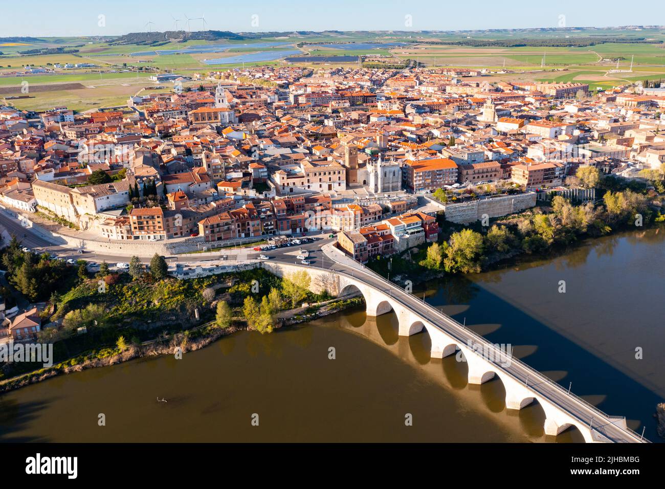 Aerial view on old stone bridge of Douro river and old town Tordesillas ...