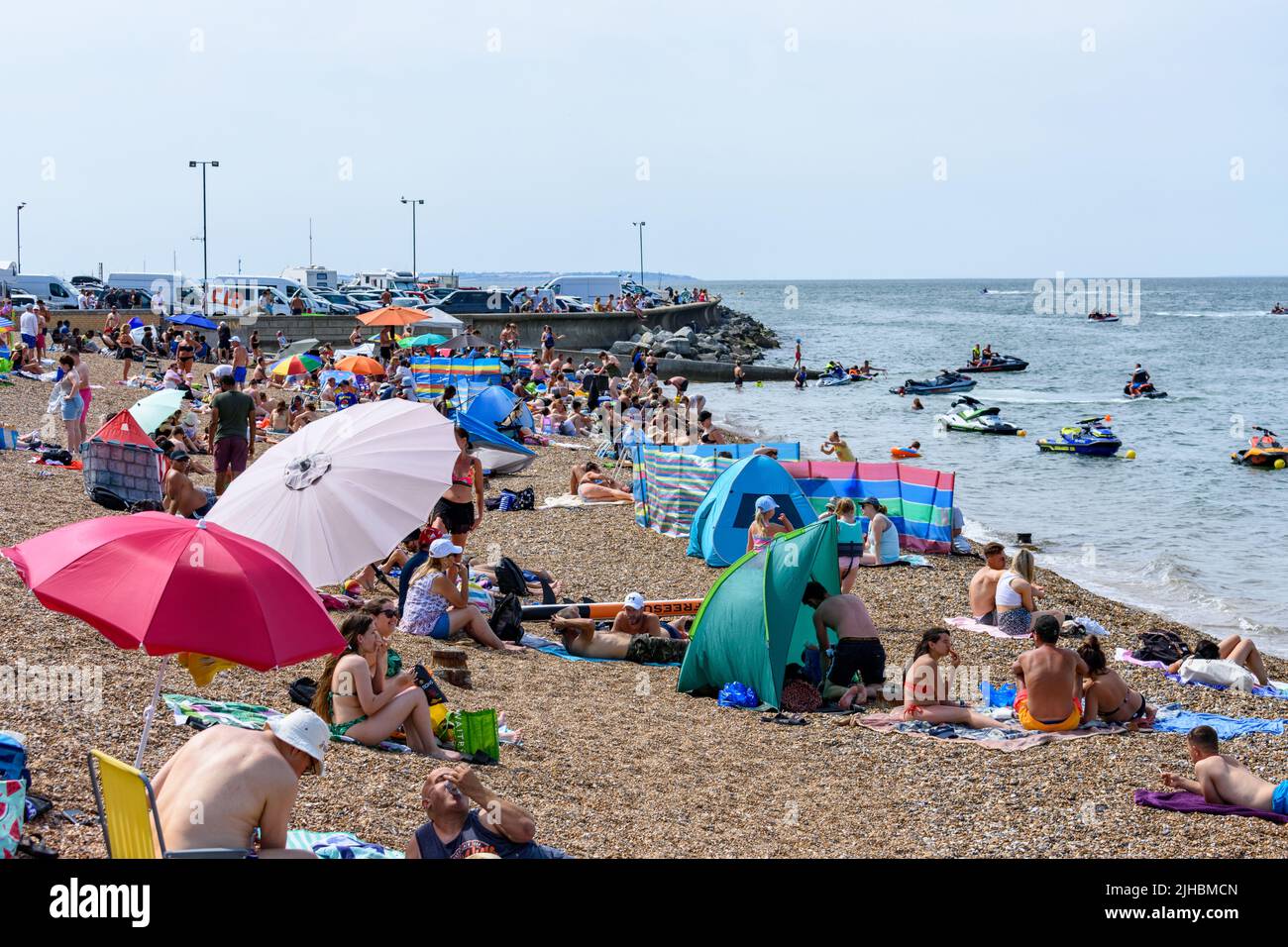Herne Bay, Kent, UK: Beachgoers bask in the sun as a record-breaking ...