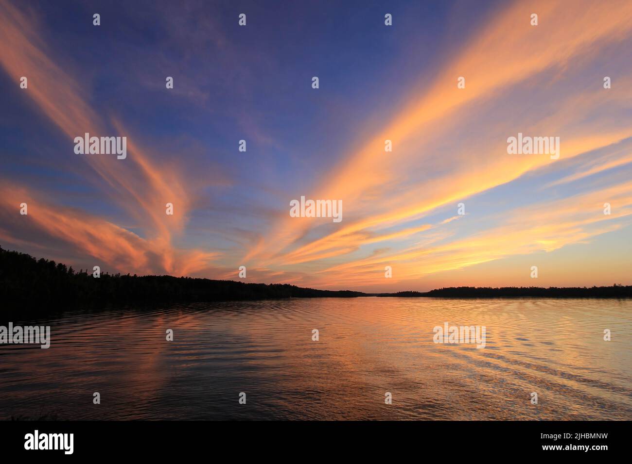 Spectacular sunset on Burntside Lake in northern Minnesota near ...