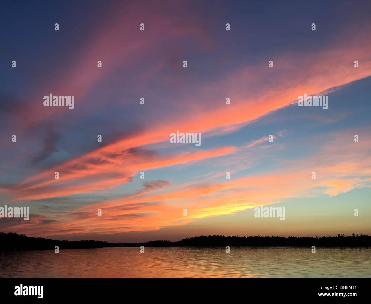Spectacular sunset on Burntside Lake in northern Minnesota near ...