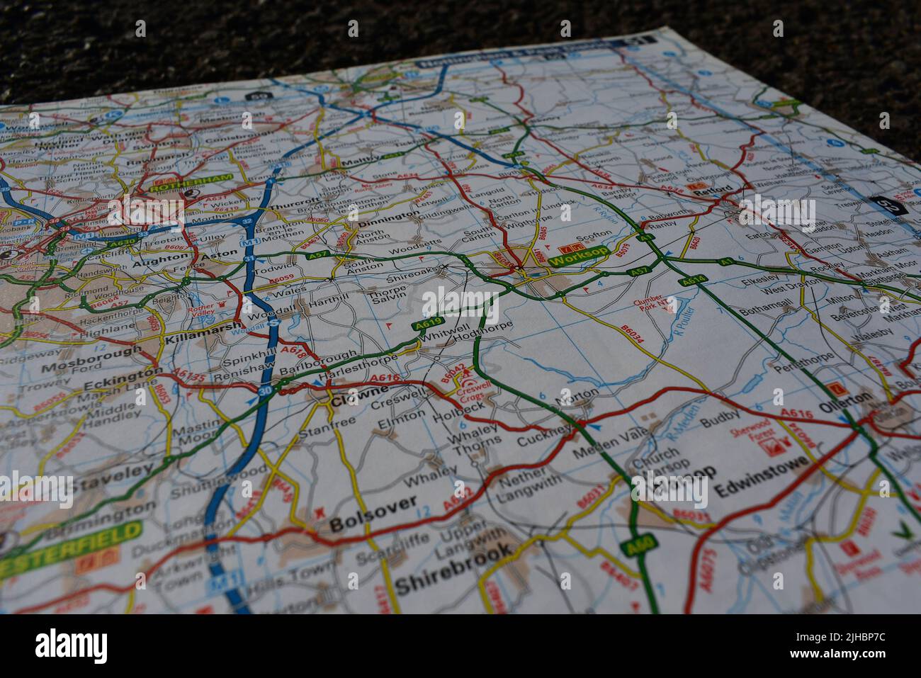 Open Road Atlas Book Placed On A Road Stock Photo - Alamy