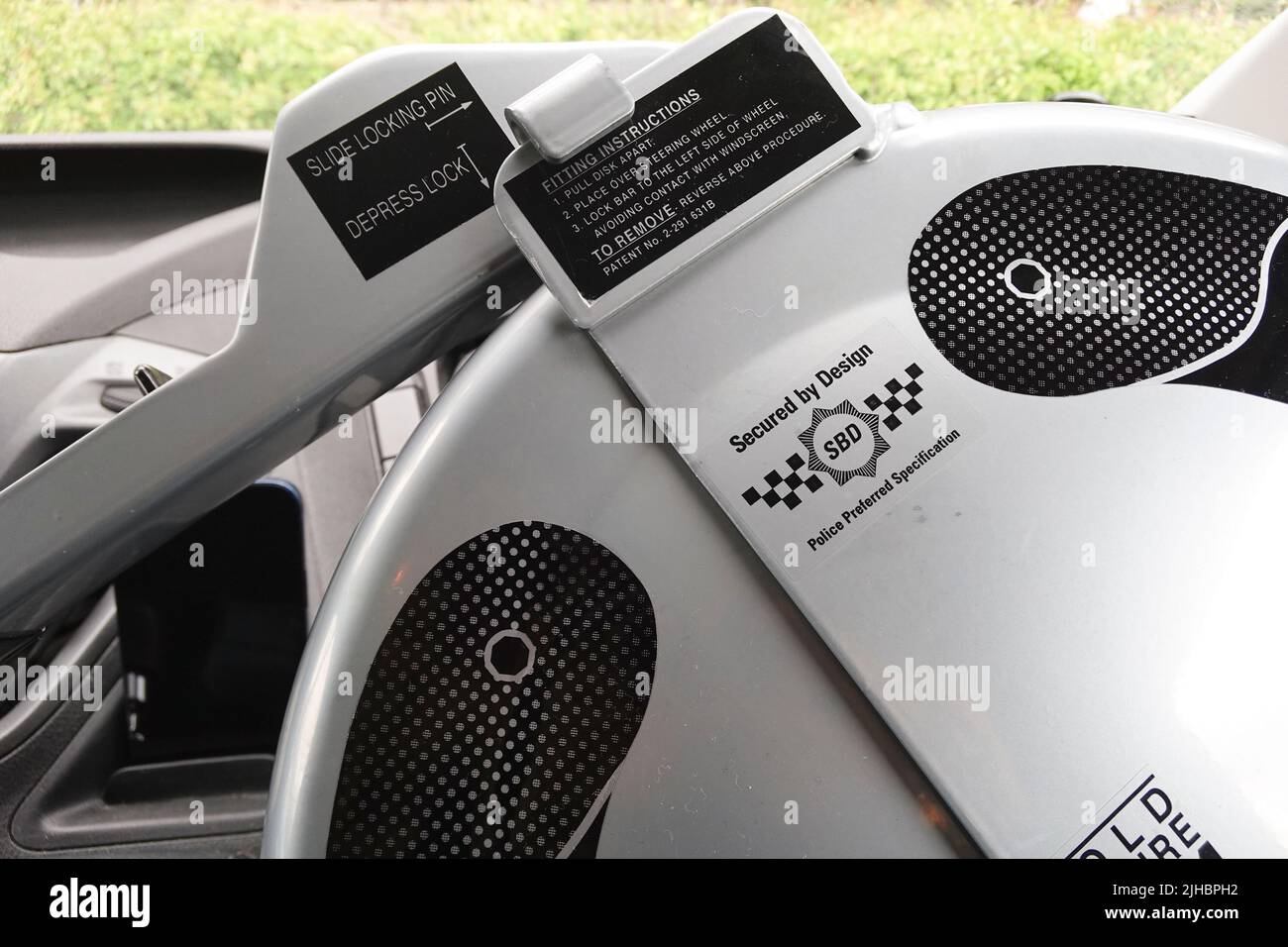Disklok high security steering wheel lock fitted to vehicle Stock Photo ...