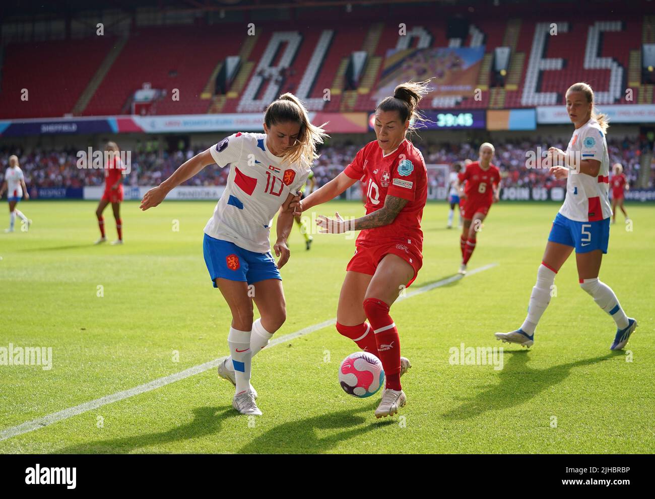 Netherlands' Danielle van de Donk (centre left) and Switzerland's ...