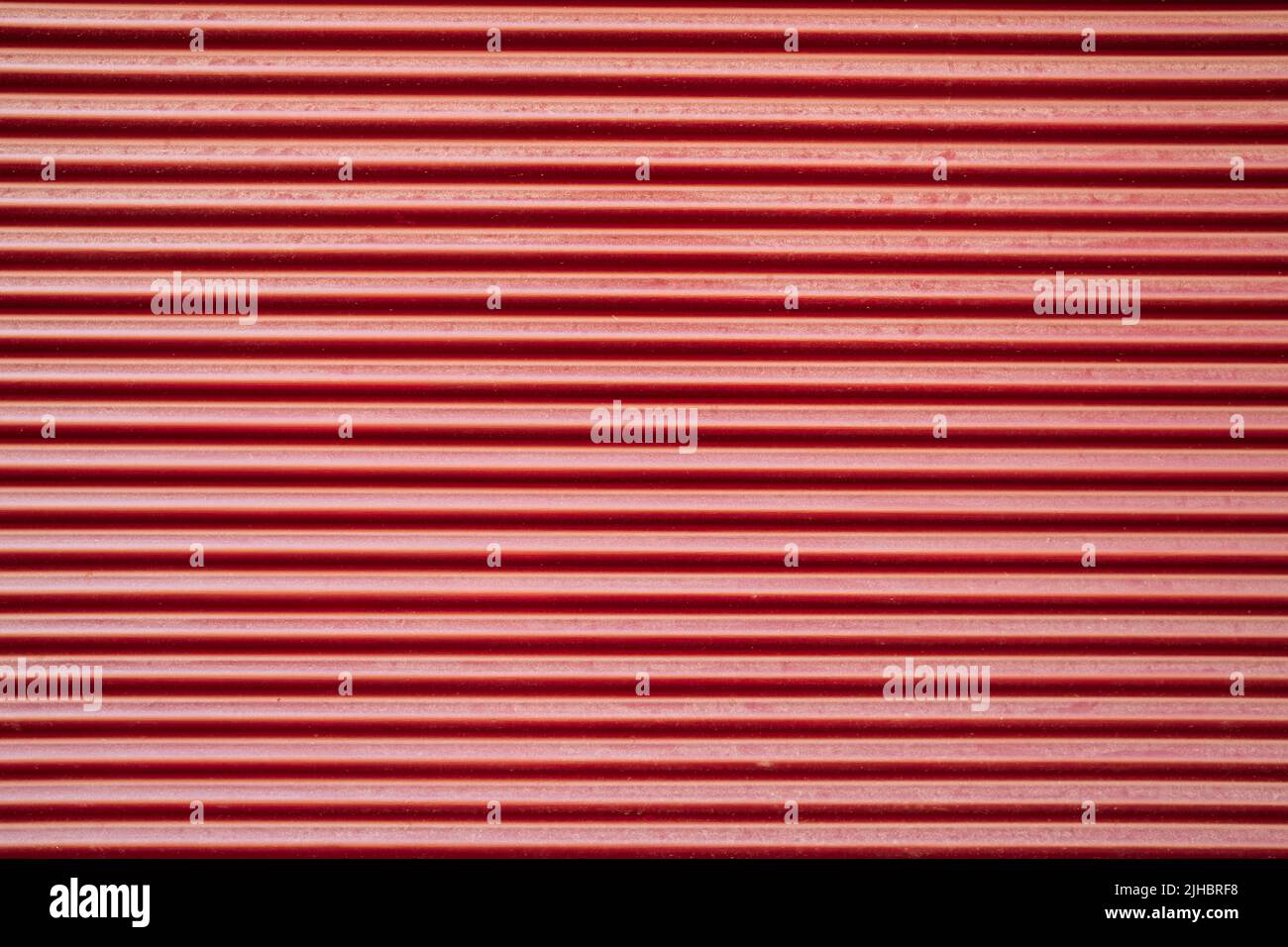 Parallel red vertical lines background. Metallic texture, real abstract ...