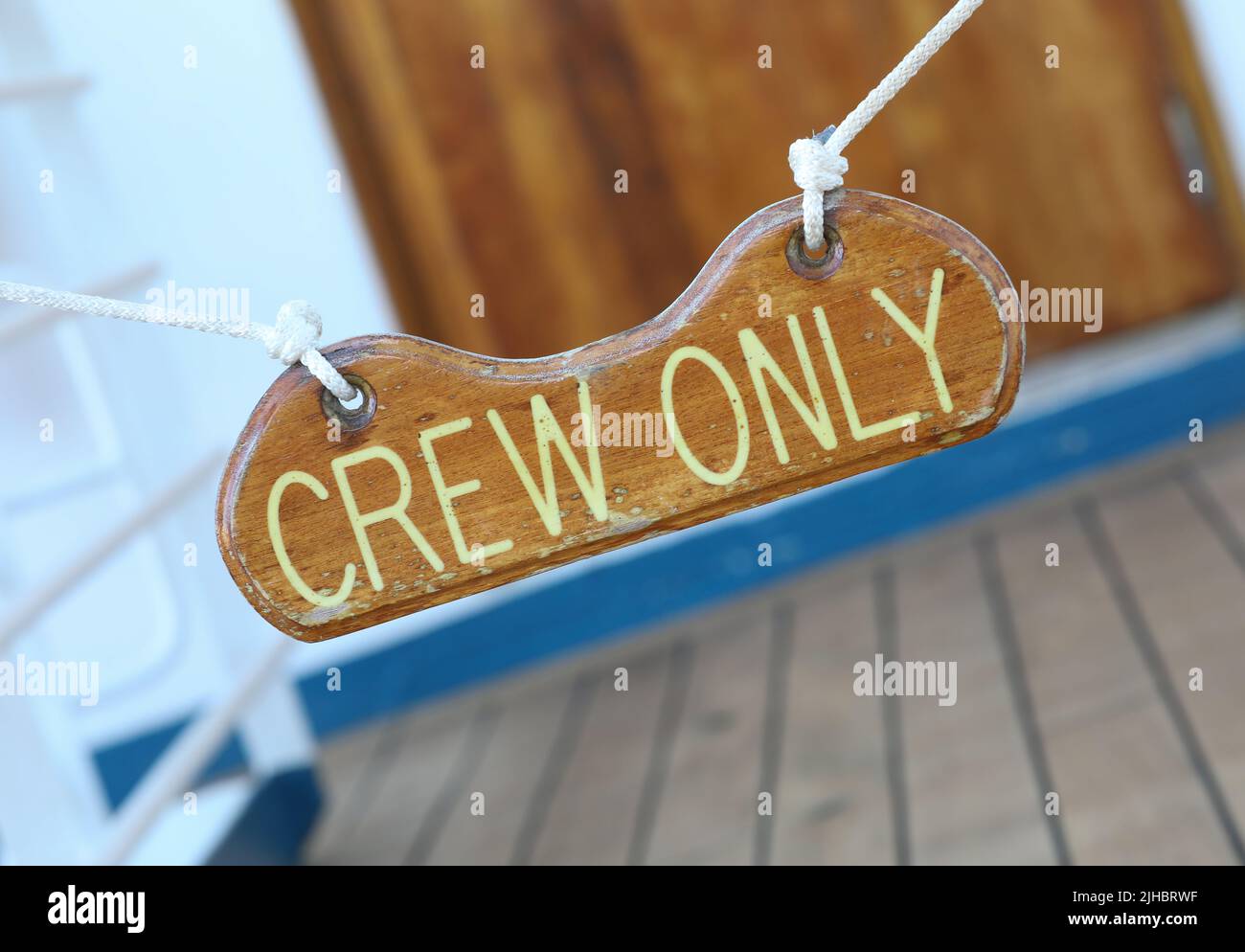 Crew only sign on a cruise ship open deck Stock Photo - Alamy