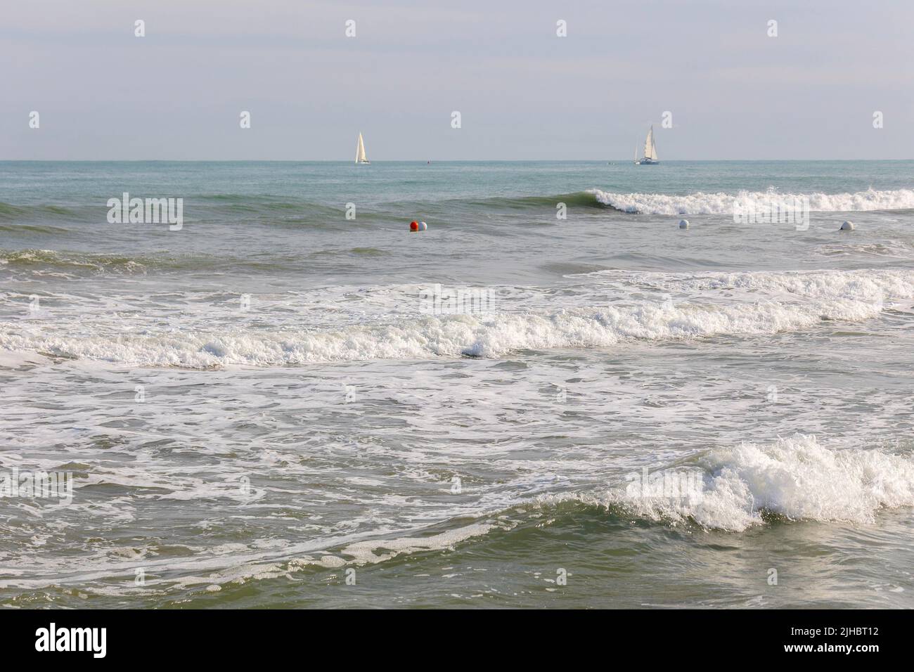 Summer vibes on the sunny autumn beach of Malvarrosa in Valencia, Spain ...