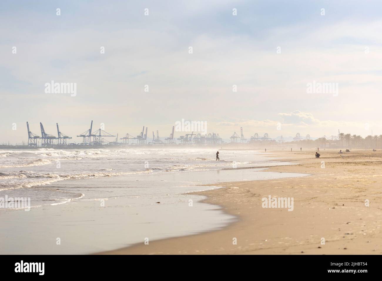 Summer vibes on the sunny autumn beach of Malvarrosa in Valencia, Spain ...