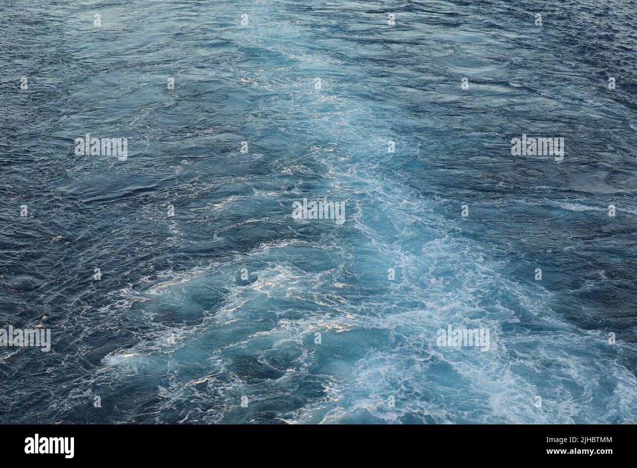 Deep ocean top view. White water wave perspective. Sea water ship trail ...