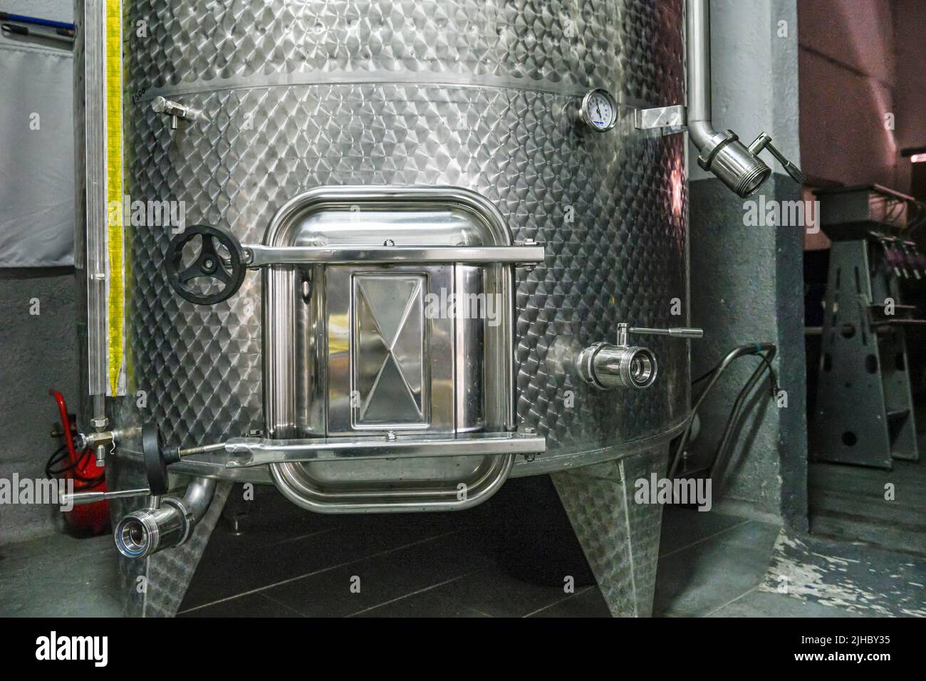 Stainless steel wine tank inside a cellar Stock Photo - Alamy