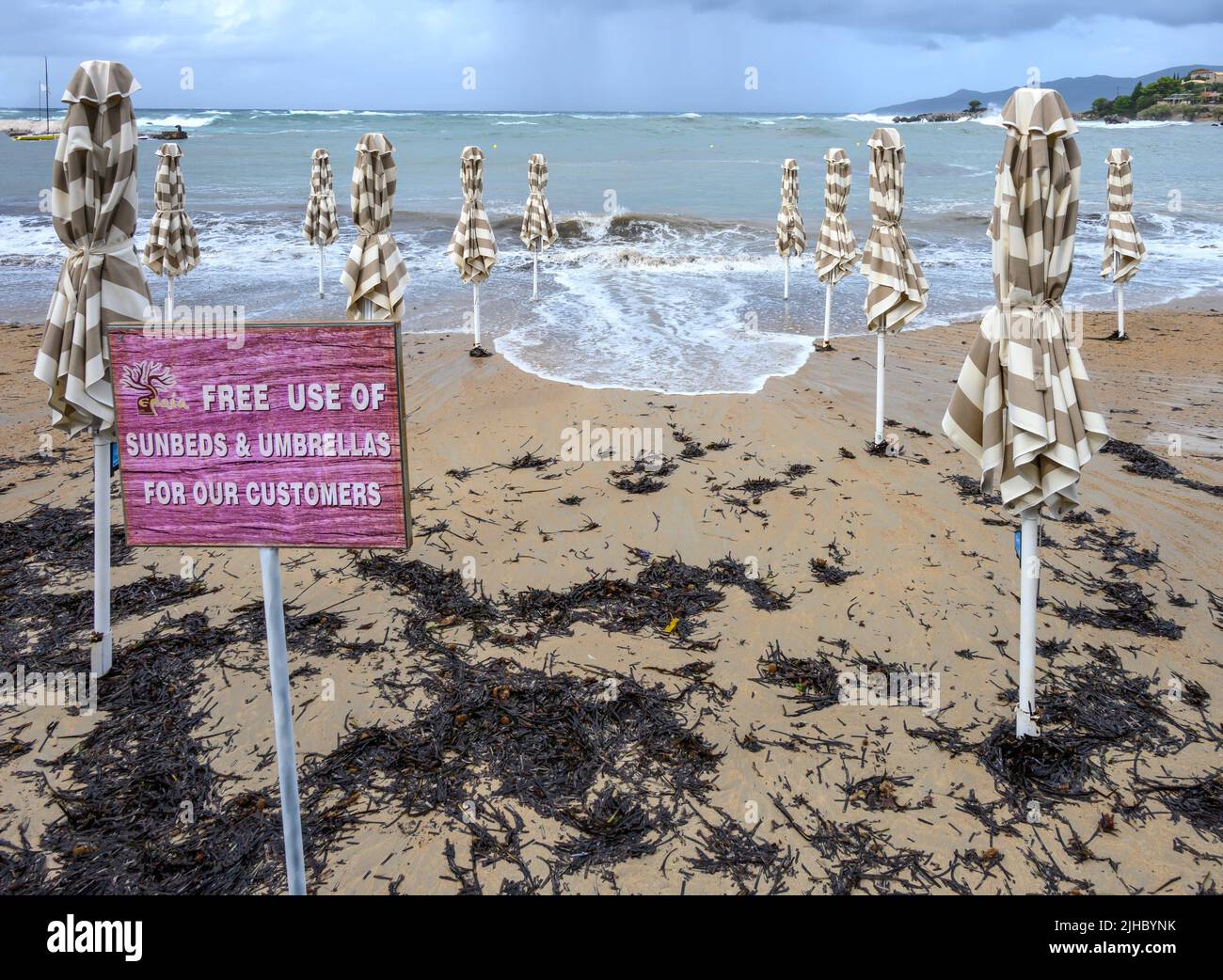 A late season storm causes waves to inundate the beach and beach ...
