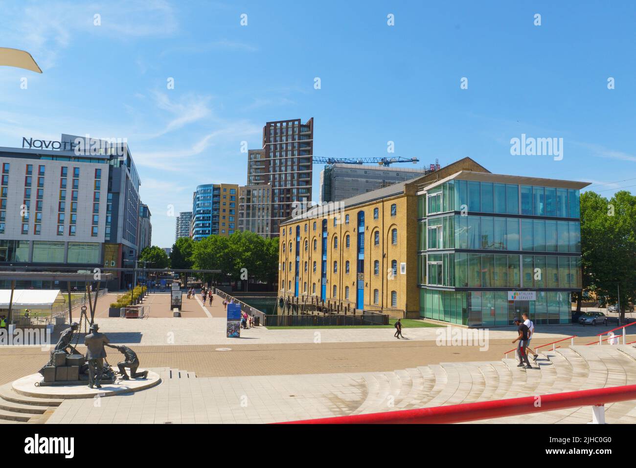View of converted warehouses, and the 'Landed' sculpture, from the ...