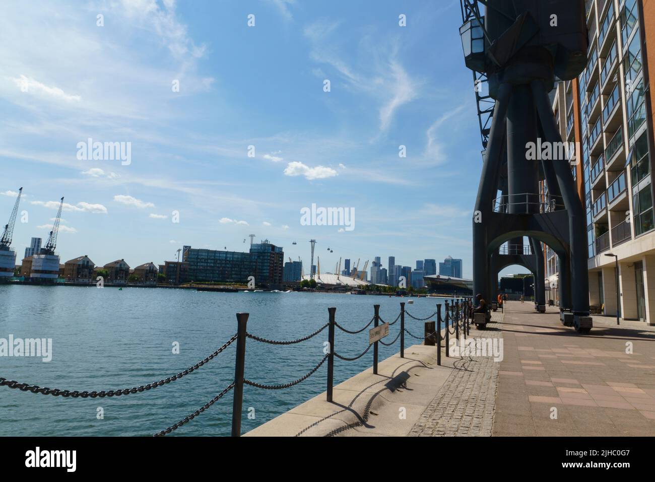 A view across the Royal Victoria Dock, London, UK, in early summer ...