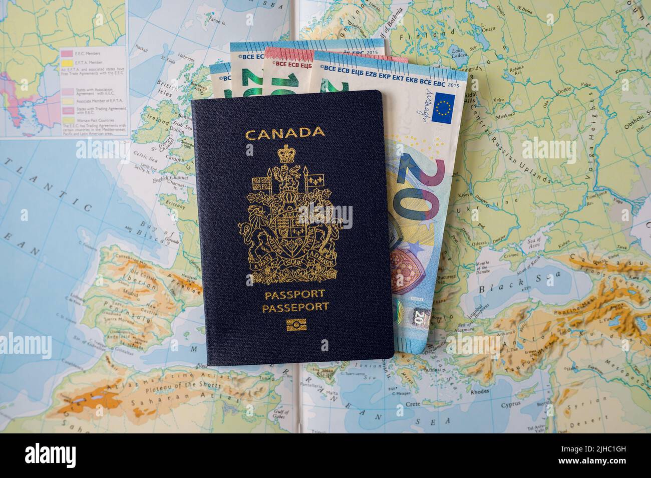 Calgary, Alberta - July 14, 2022: Canadian passport with eruos on an ...