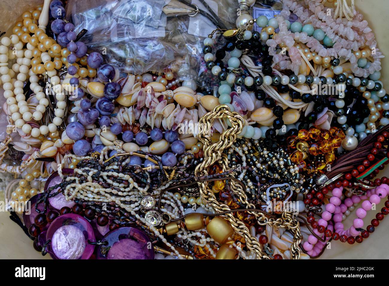 Colorful beads and metal chains at the flea market in Hanover (Nr. 1 ...