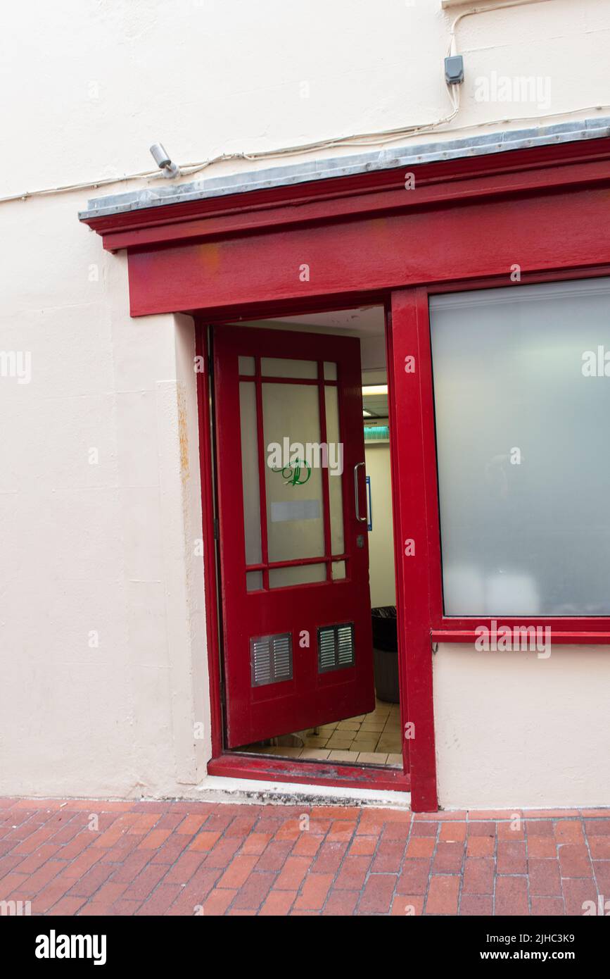 Red Shop door open Stock Photo - Alamy