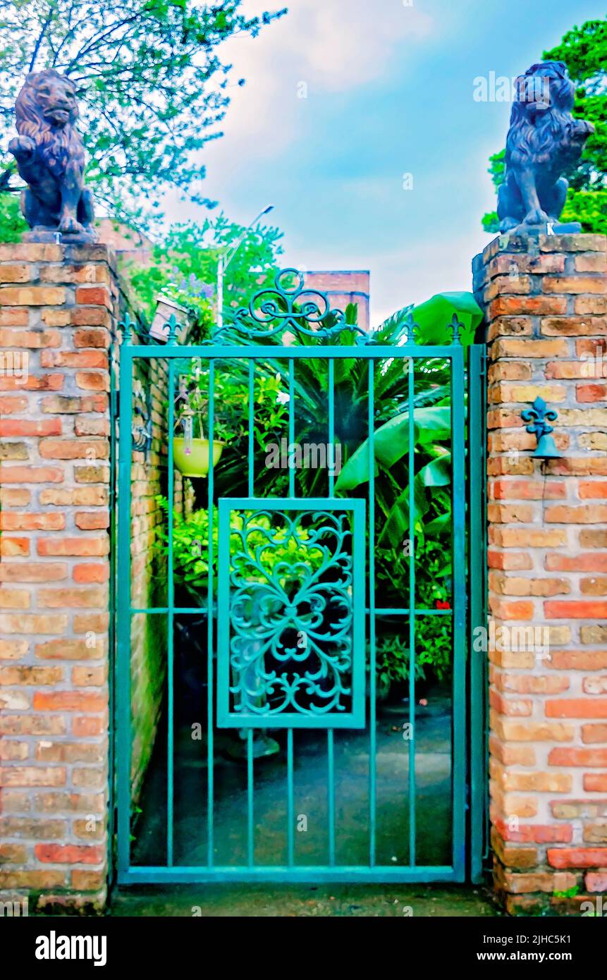 A decorative gate leads to the Myers House, which served as Mobile’s ...