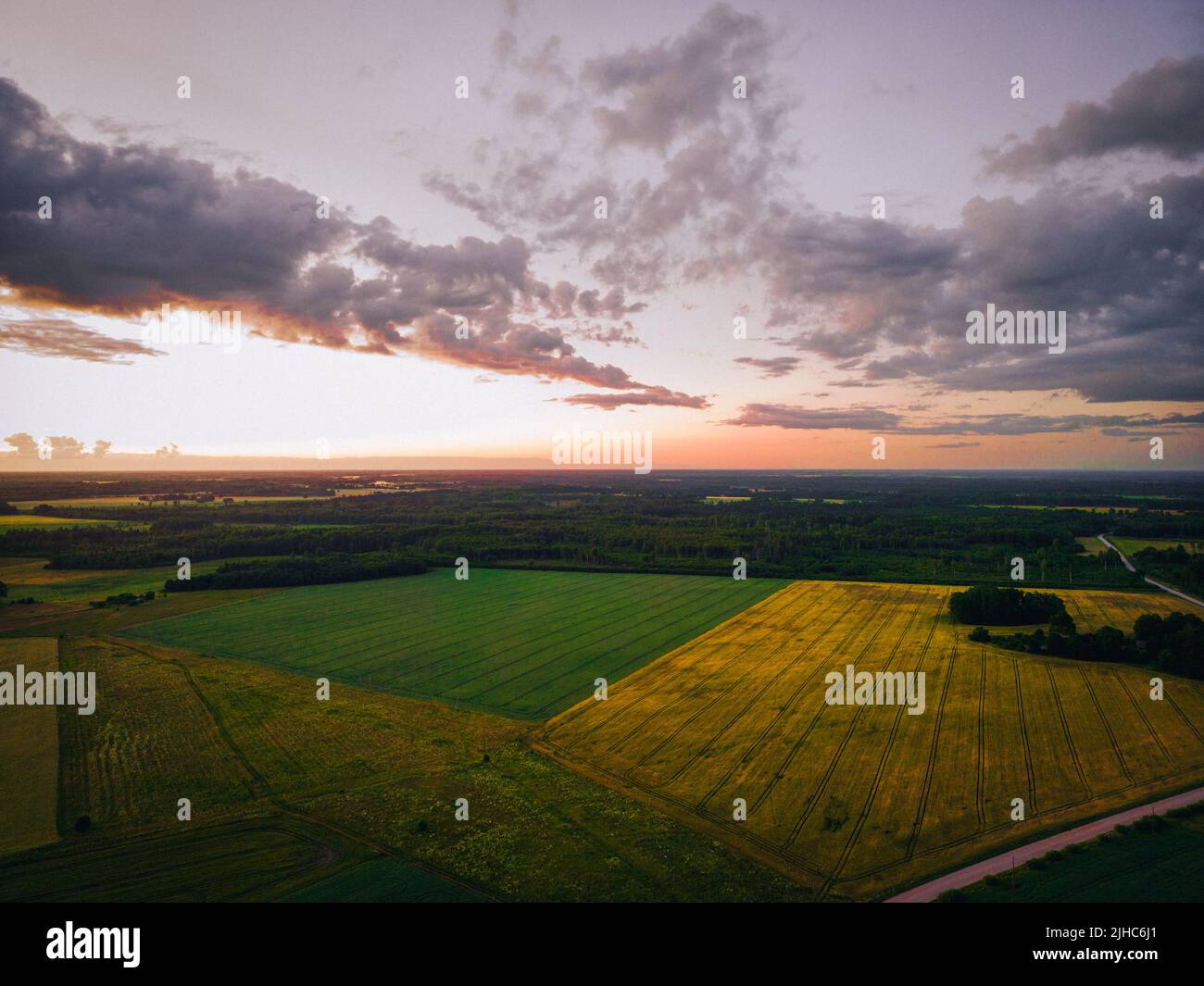 An aerial view of a field at sunset Stock Photo - Alamy