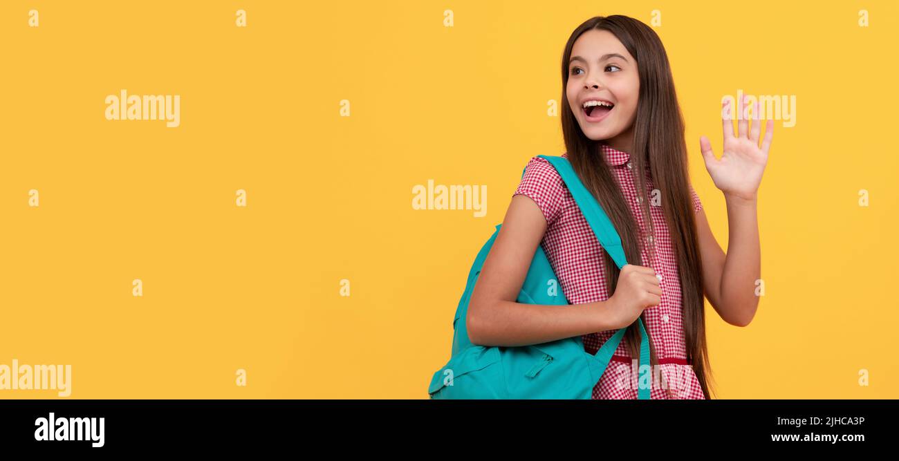 hello knowledge day. concept of education. kid with long hair on yellow background. Portrait of ...