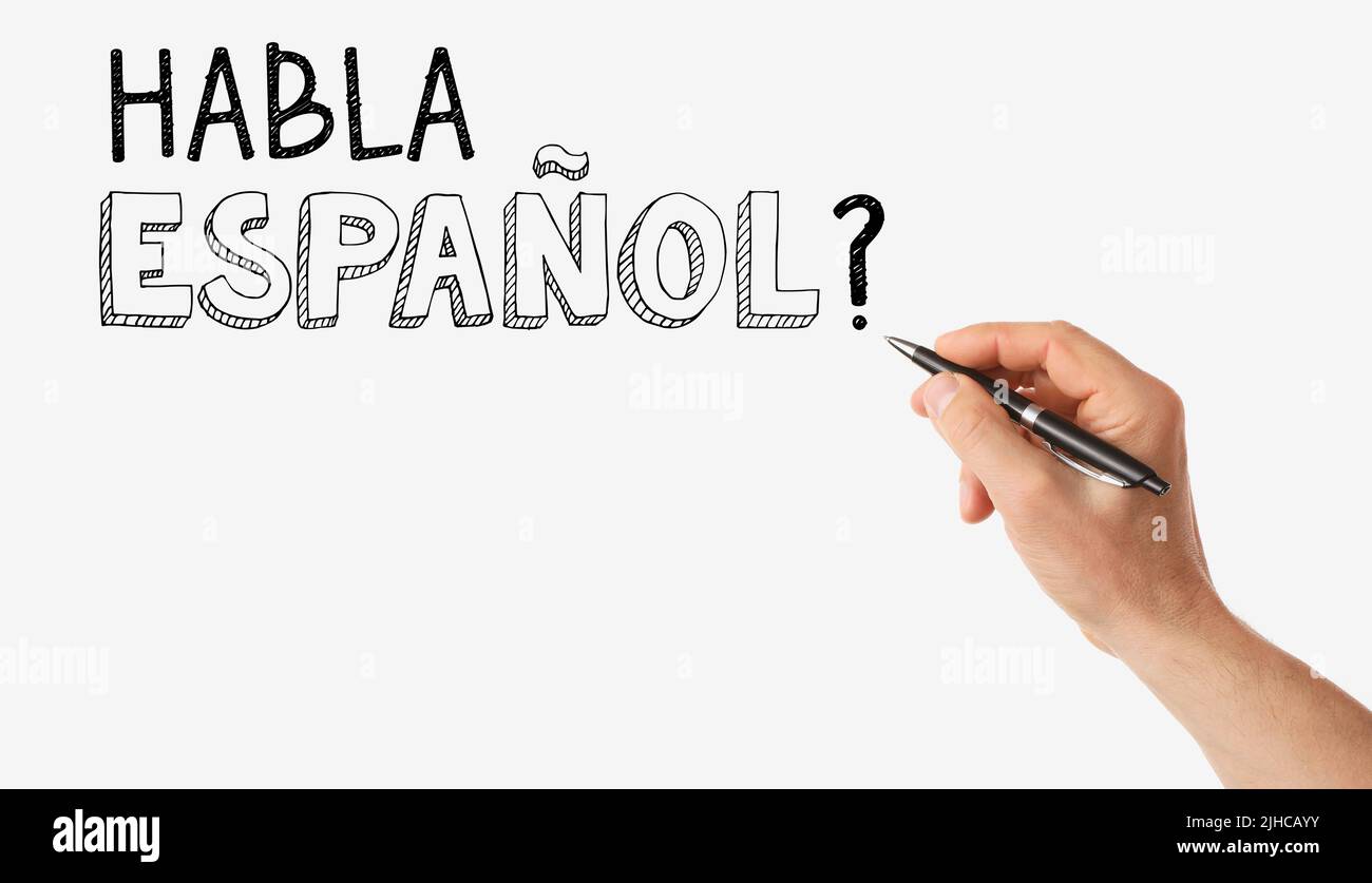 Hand writing text HABLA ESPANOL? (DO YOU SPEAK SPANISH?) on white ...