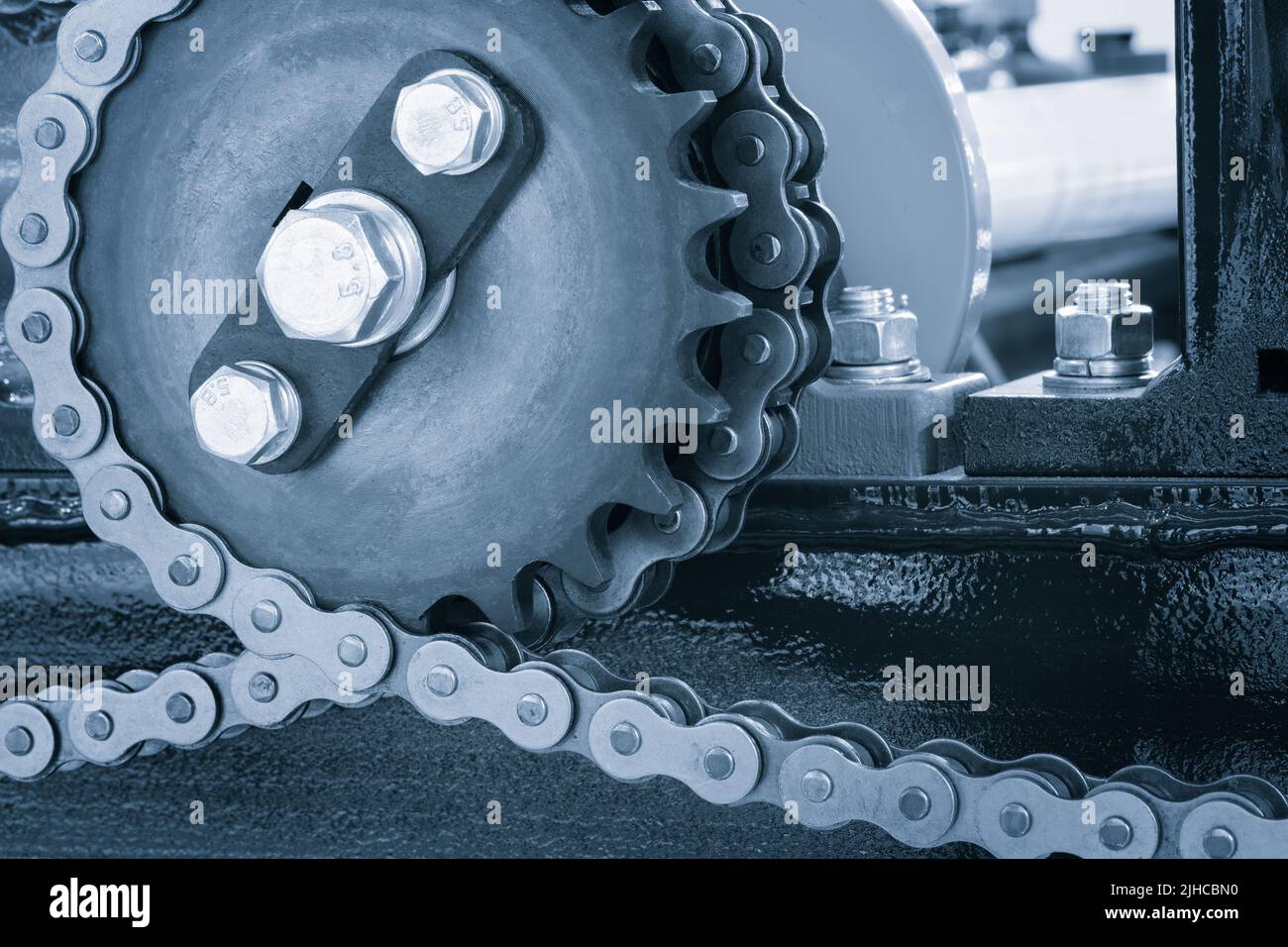 Gear chain drive shaft in conveyor belt is on production line. Timing ...