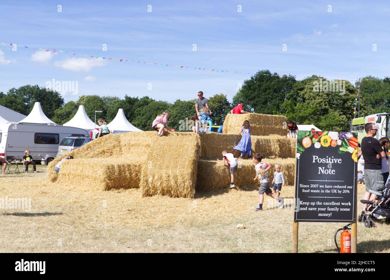Children playing on hay bales at the Tendring Hundred Show 2022 in ...