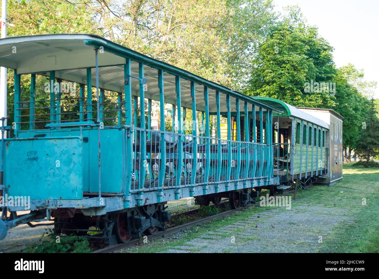 Old rusty tram. An old dilapidated tram at the dump. Tram the ghost ...