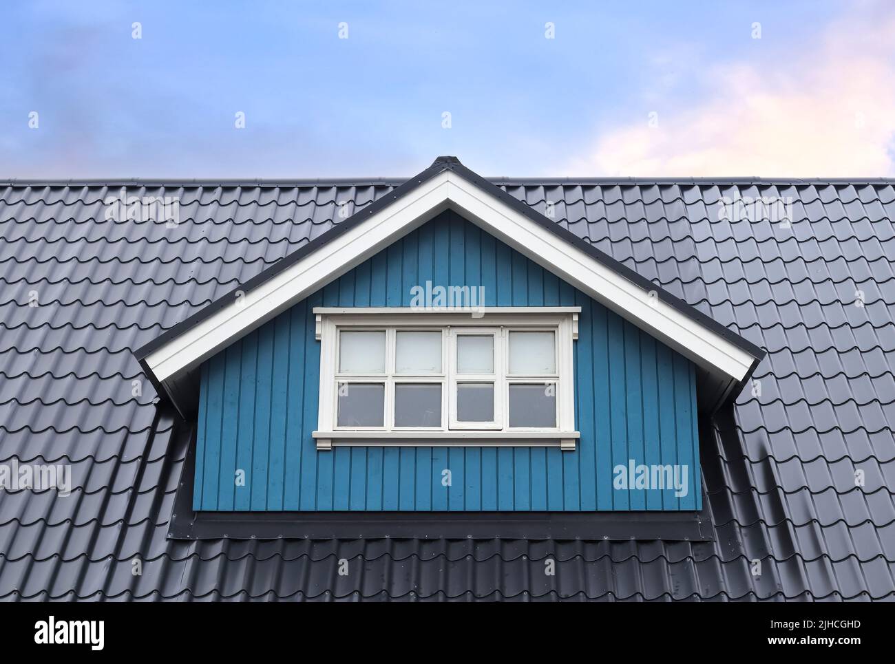 Roof window in velux style with roof tiles - icelandic architecture ...
