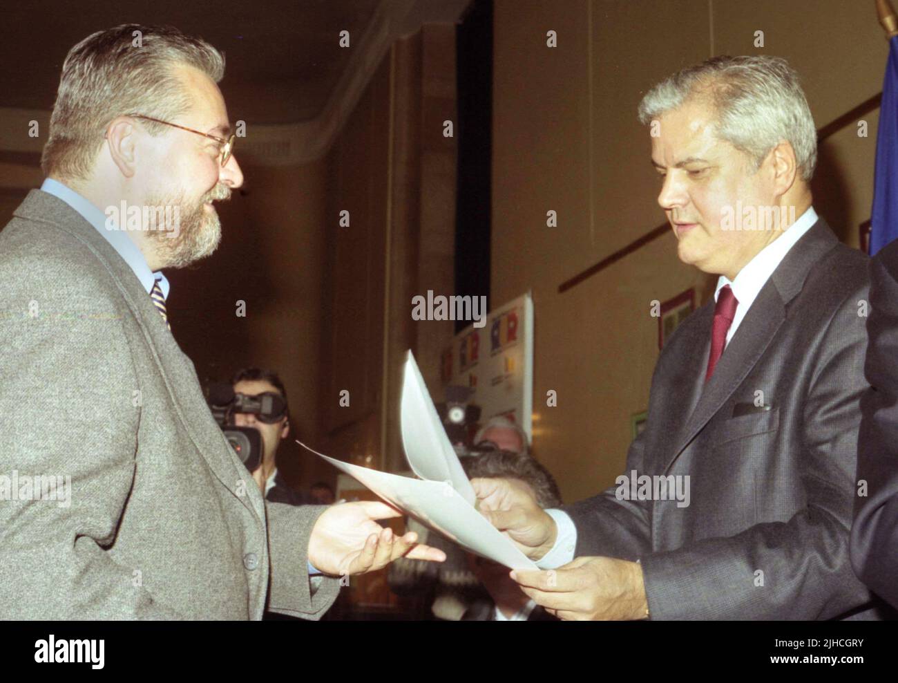 Romanian Prime Minister Adrian Năstase (left) awarding various ...