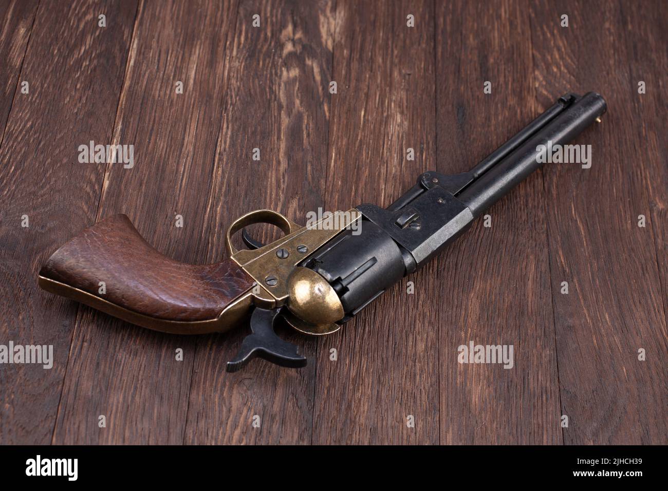 Old West gun - Percussion Army Revolver on wooden table Stock Photo - Alamy