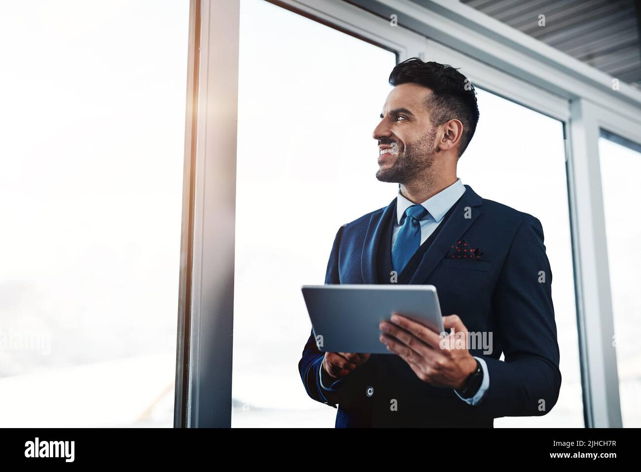 The corporate life always has him contemplating. a handsome male ...