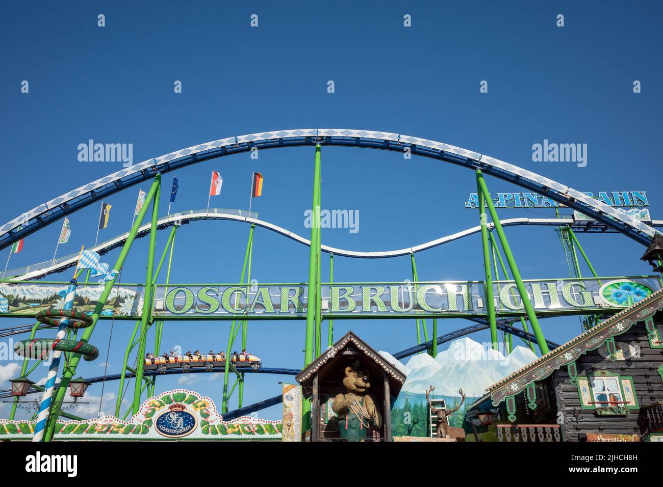 Outdoor scenery with people in front of colourful illuminated track of ...