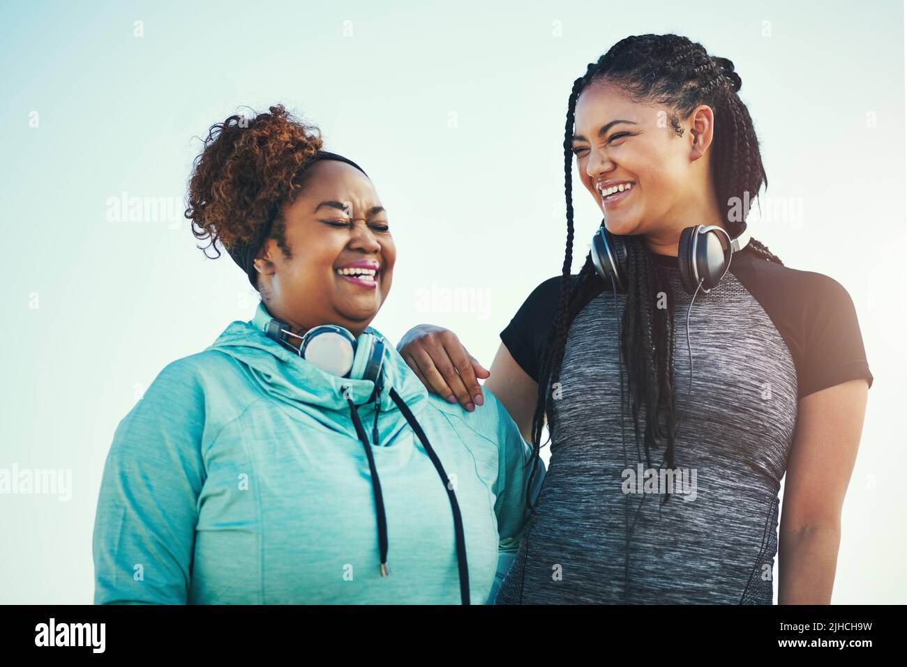 Feels great to be working out with my favourite girl. two sporty young ...