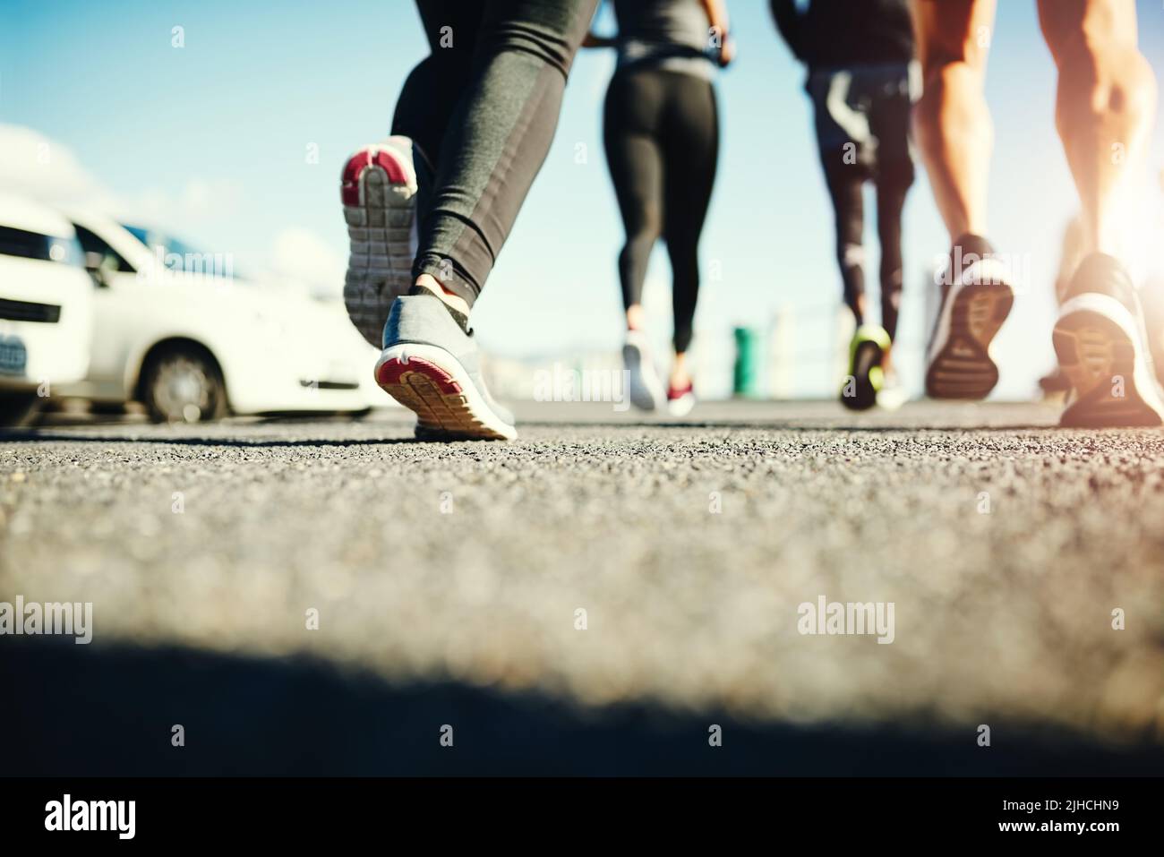 Powering through their group run. Closeup shot of a group of ...