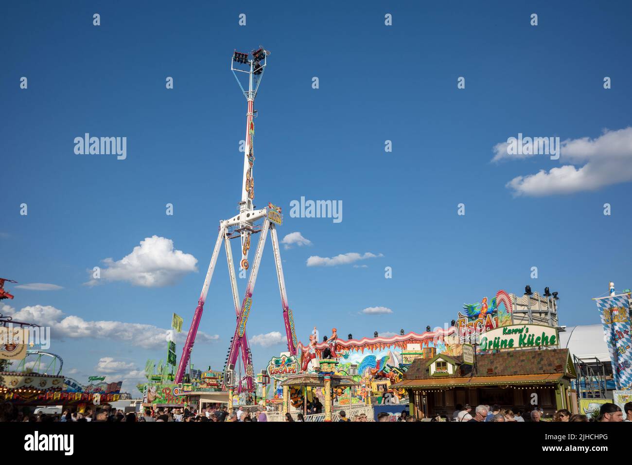 Outdoor sunny view of pendulum amusement ride, rotate and swing down ...