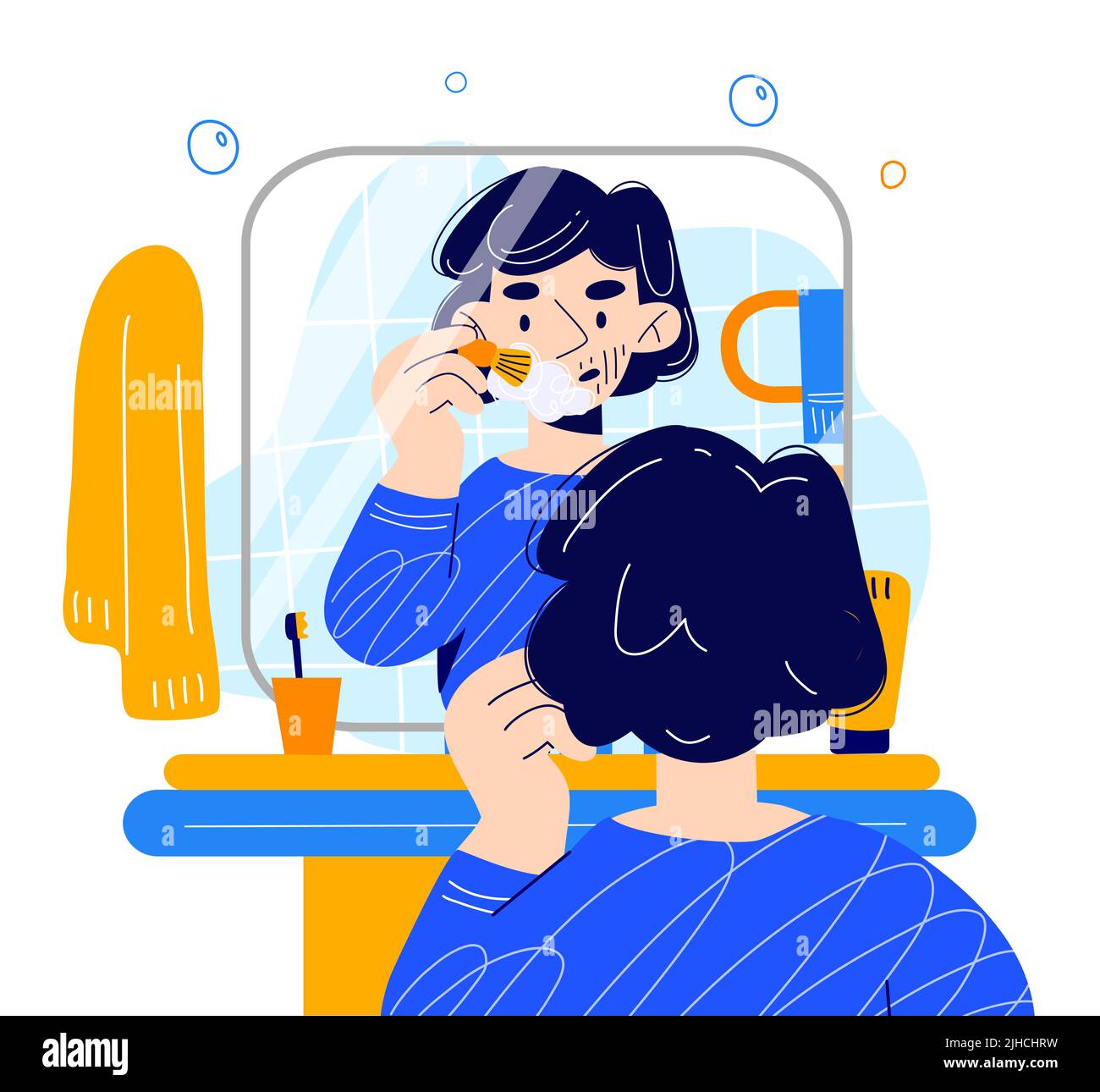Man shaves in bathroom. Guy smears face with shaving foam in front of ...