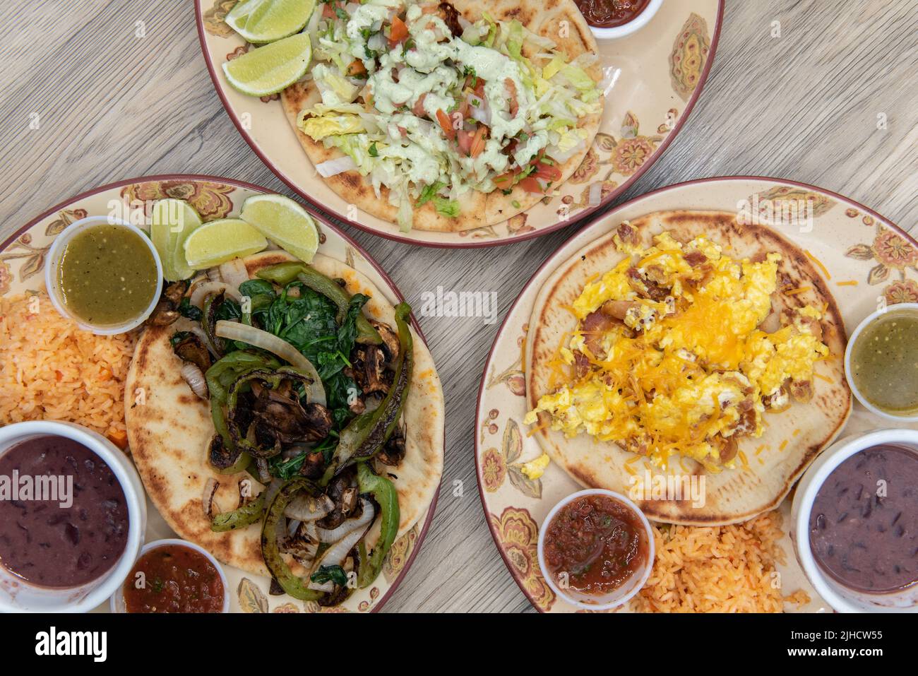 Overhead view of thick homemade tortillas holds a variety of choices ...