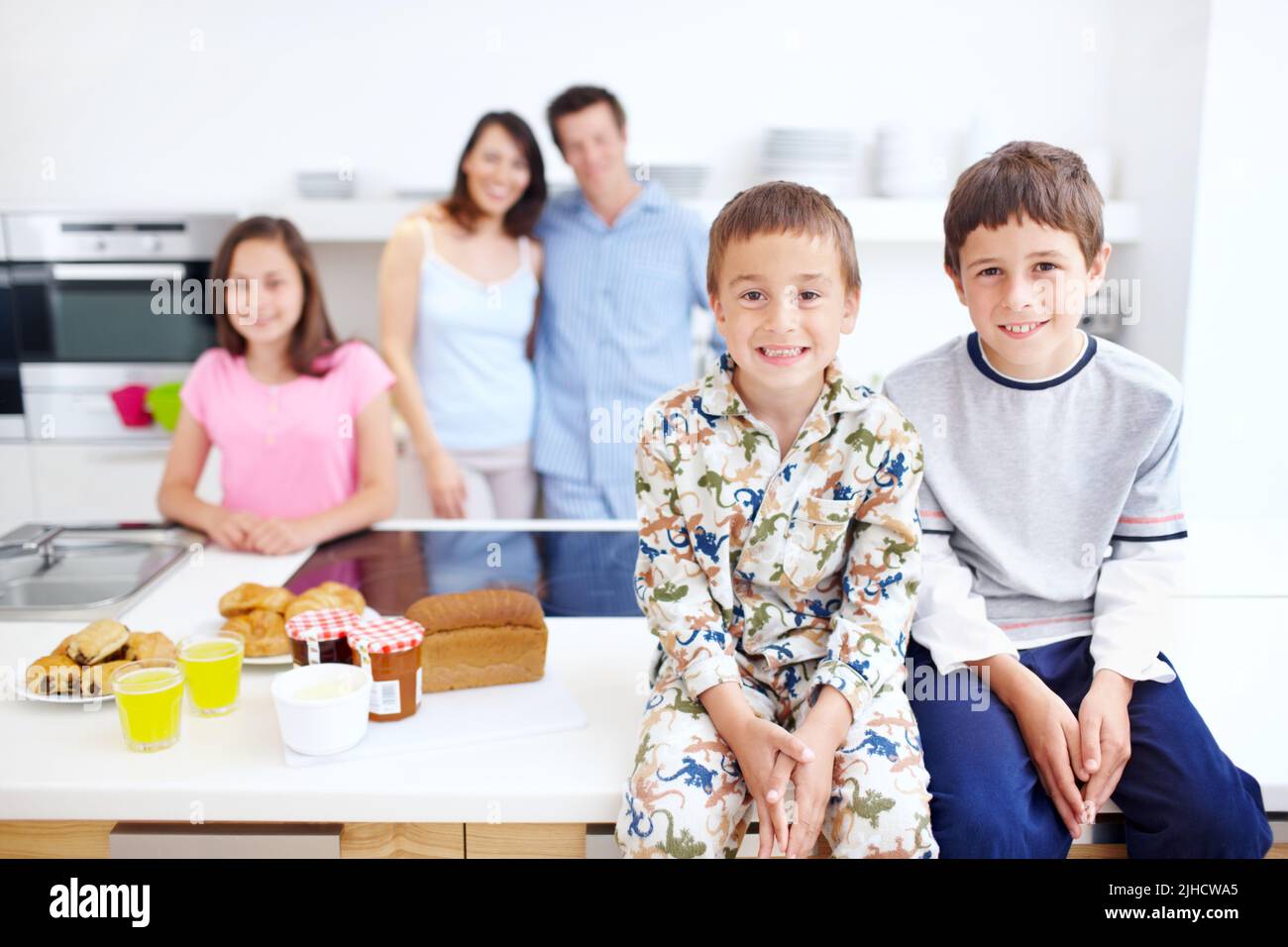 Excited to eat a scrumptious breakfast together. Two adorable boys ...