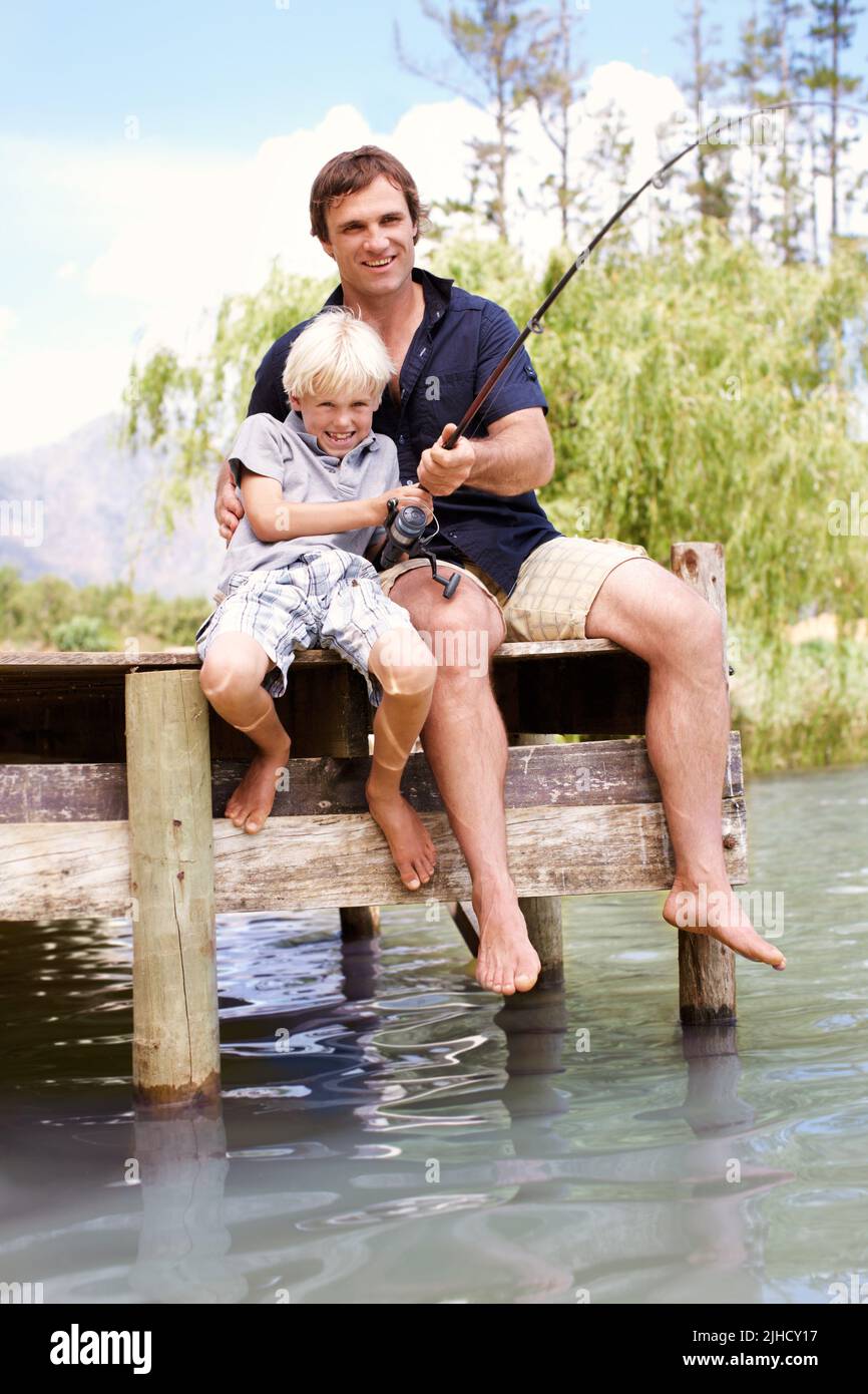 Reeling in a fish hi-res stock photography and images - Alamy